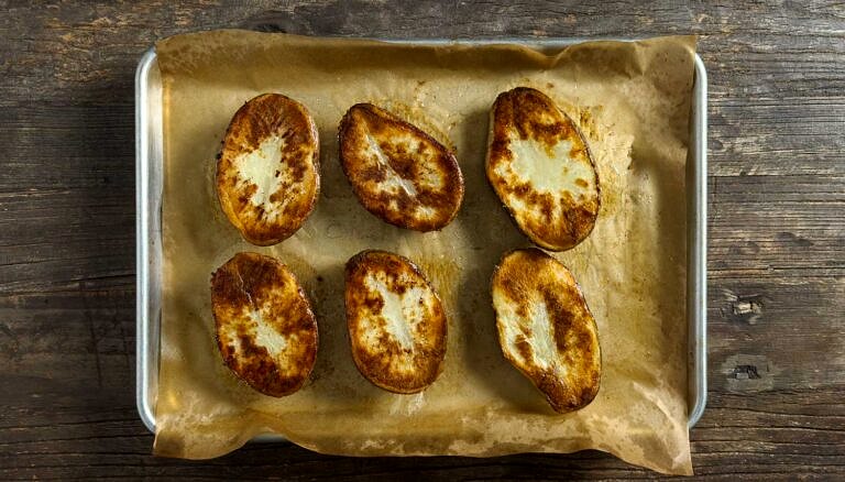 Baked Potato Halves with Garlic Butter - The Salted Potato from Renée ...