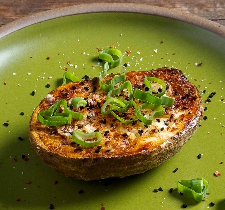 Baked Potato Halves with Garlic Butter - The Salted Potato from Renée ...